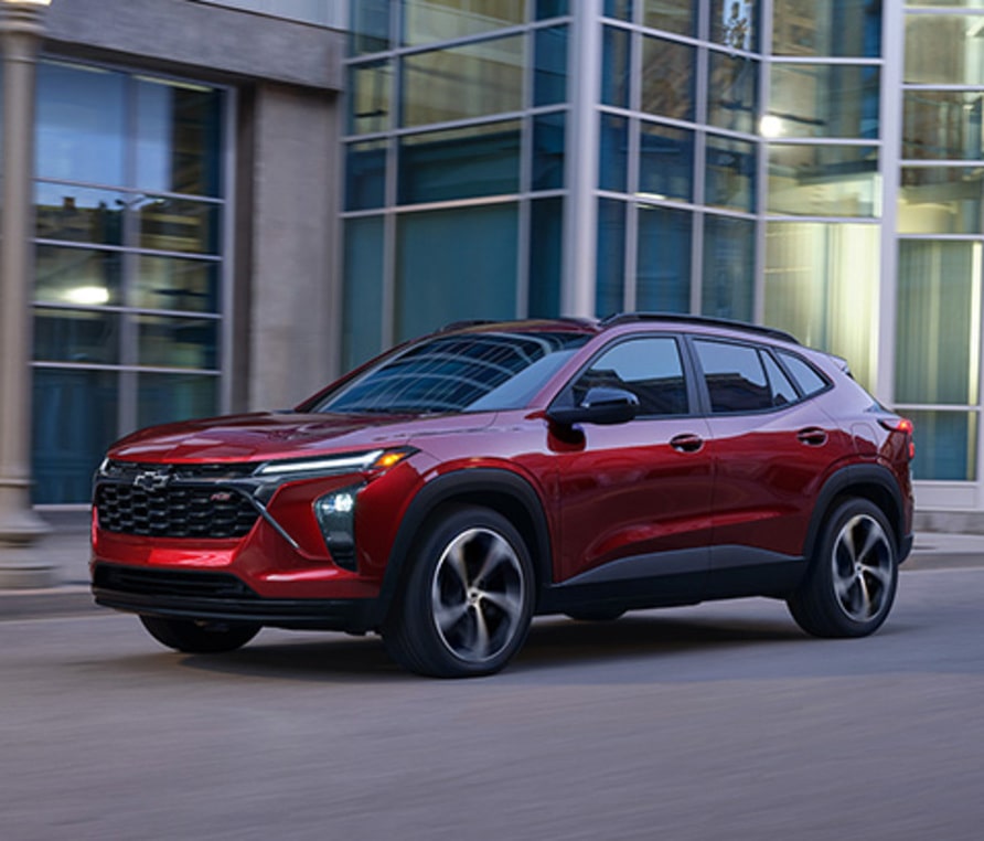 Side-view of the 2025 Chevrolet Trax small SUV in motion.